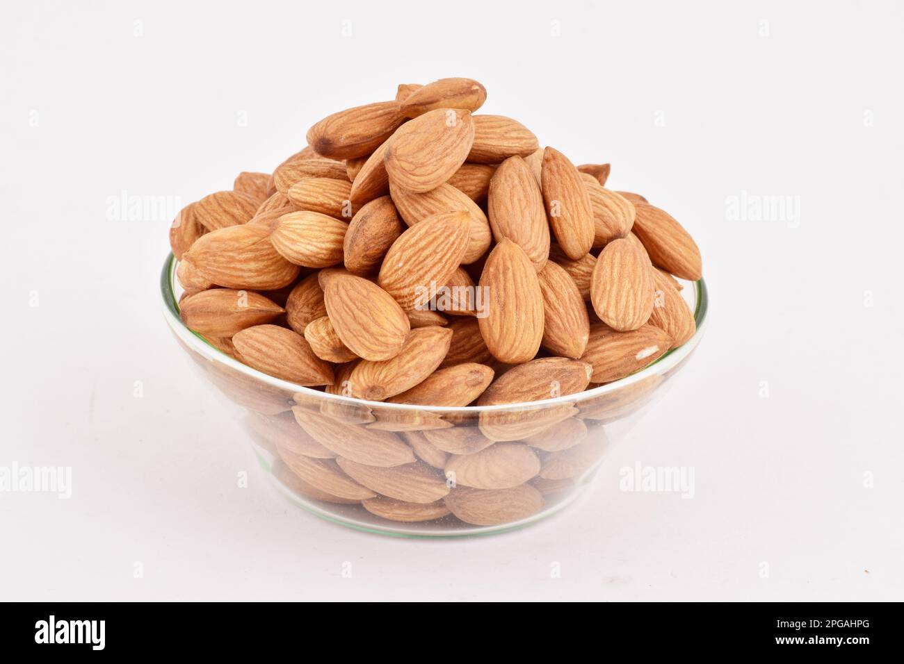 Almond bowl on white background Stock Photo - Alamy