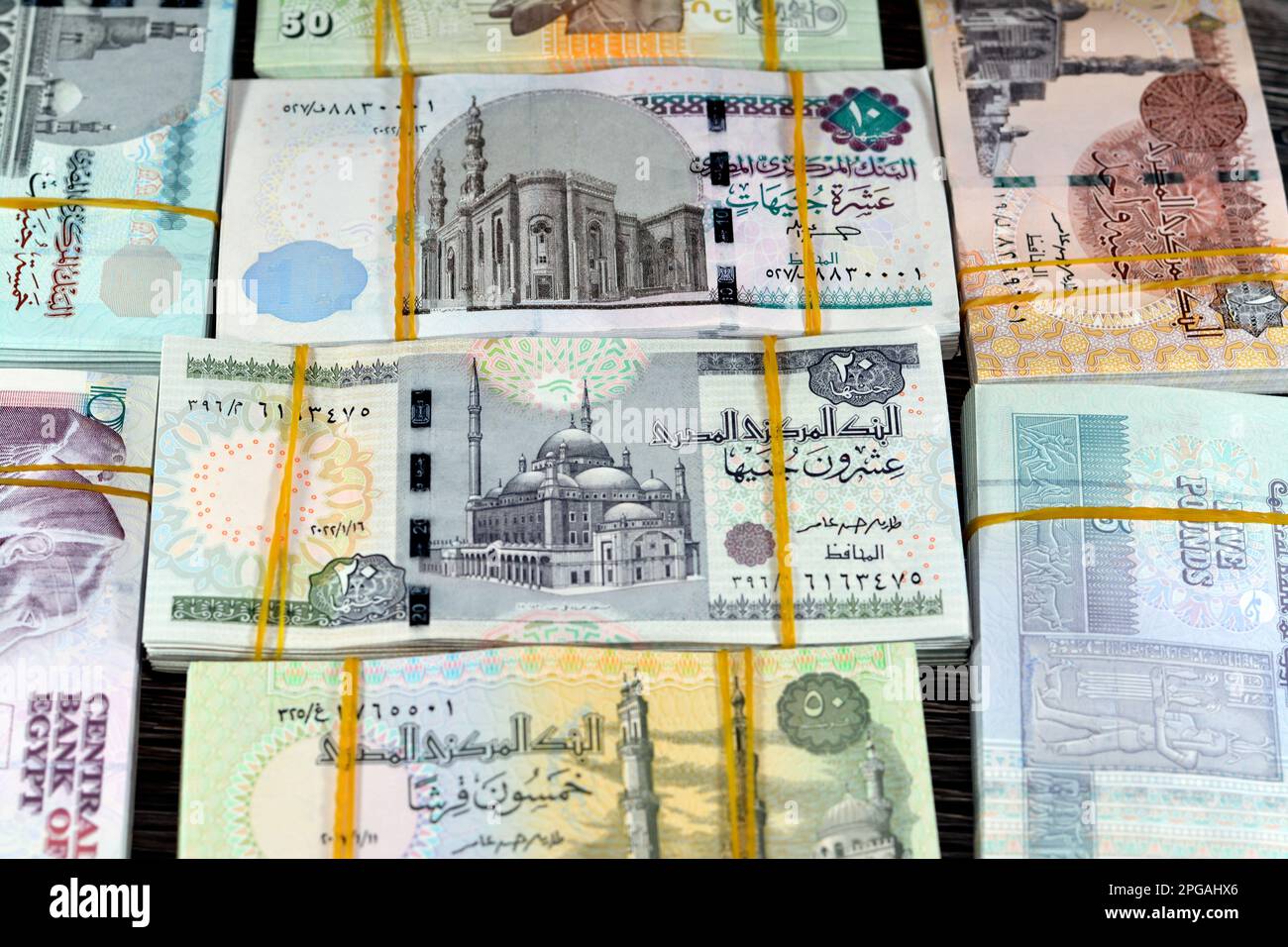 Pile and stacks of Egyptian money currency cash banknotes put together ...