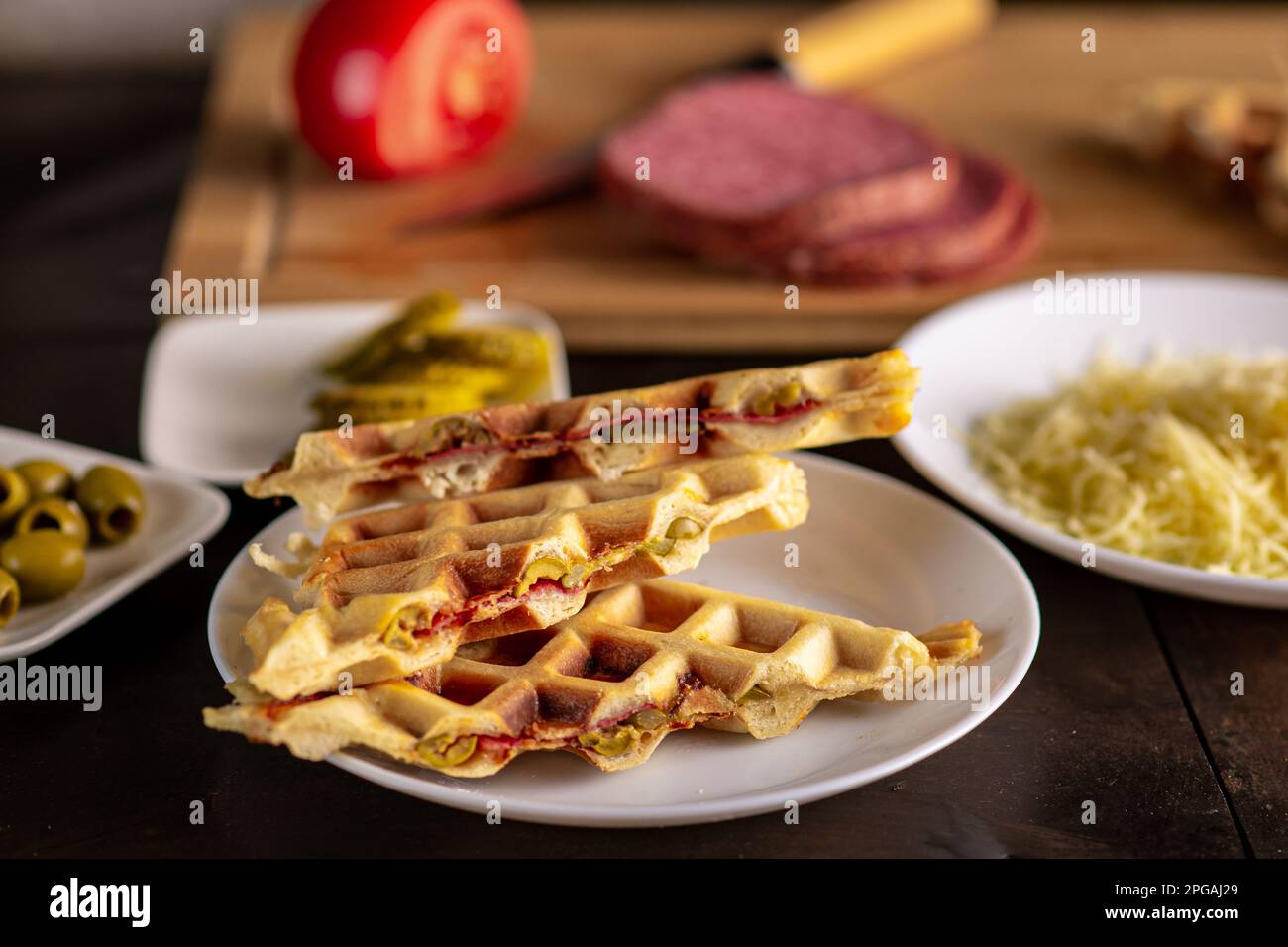 Waffle sandwich with salami, cheese, tomato. waffle pizza, piffle Stock ...