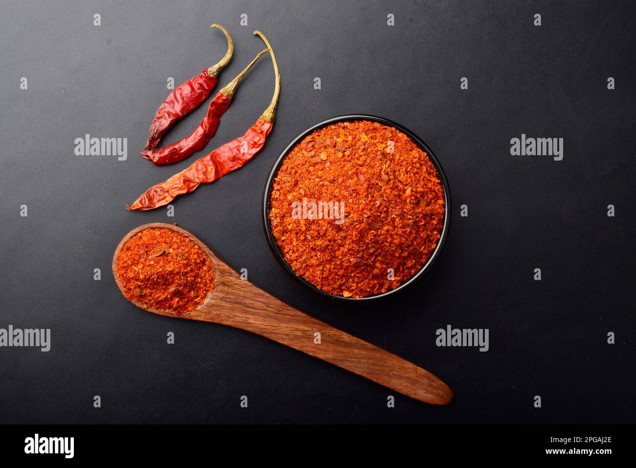 Top view of ground red chilli powder with cayenne chilli Stock Photo ...