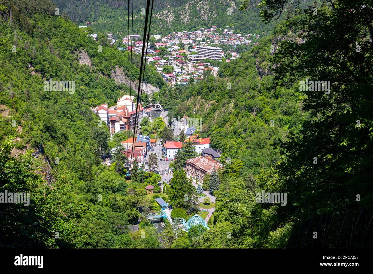 Borjomi town aerial view seen from cable car above the city, resort ...