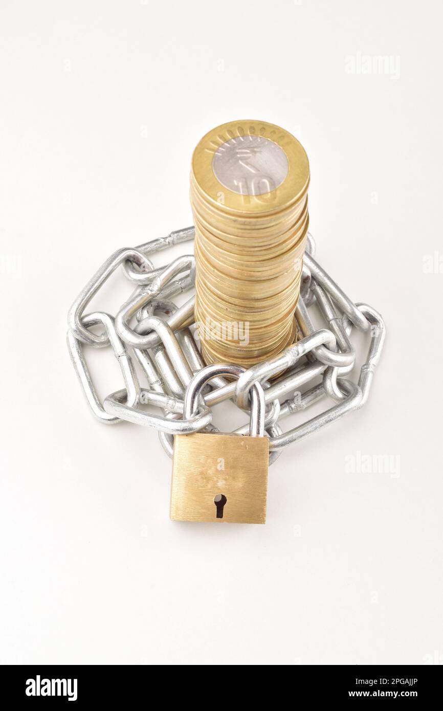 Indian rupees coin with lock isolated on white background, money ...