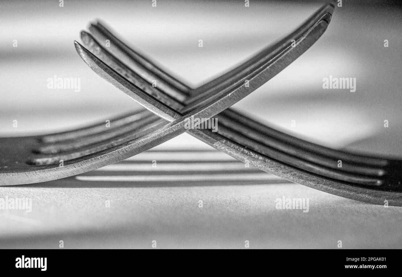 Old dinner forks Black and White Stock Photos & Images - Alamy