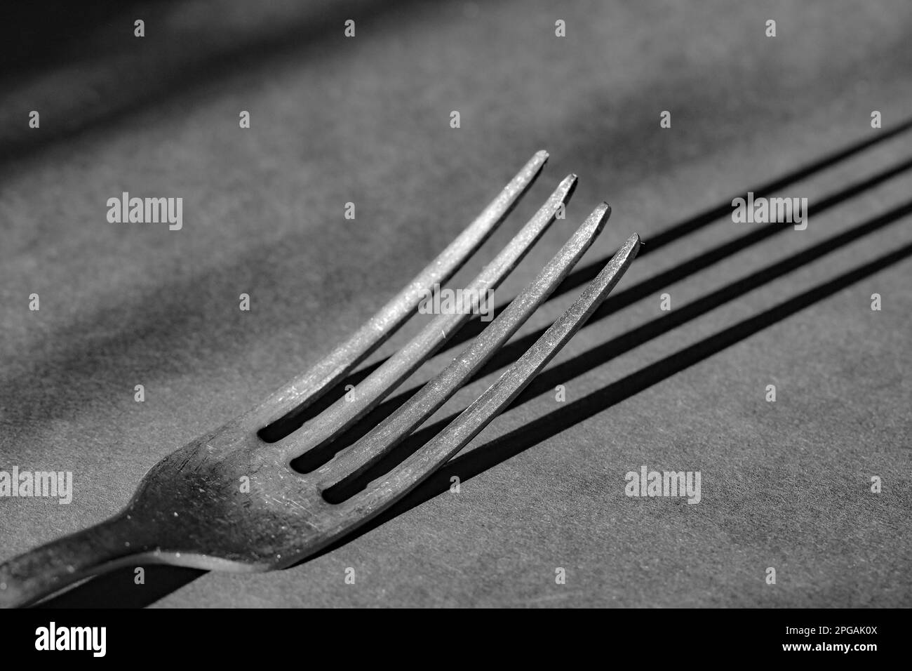 Old dinner forks Black and White Stock Photos & Images - Alamy