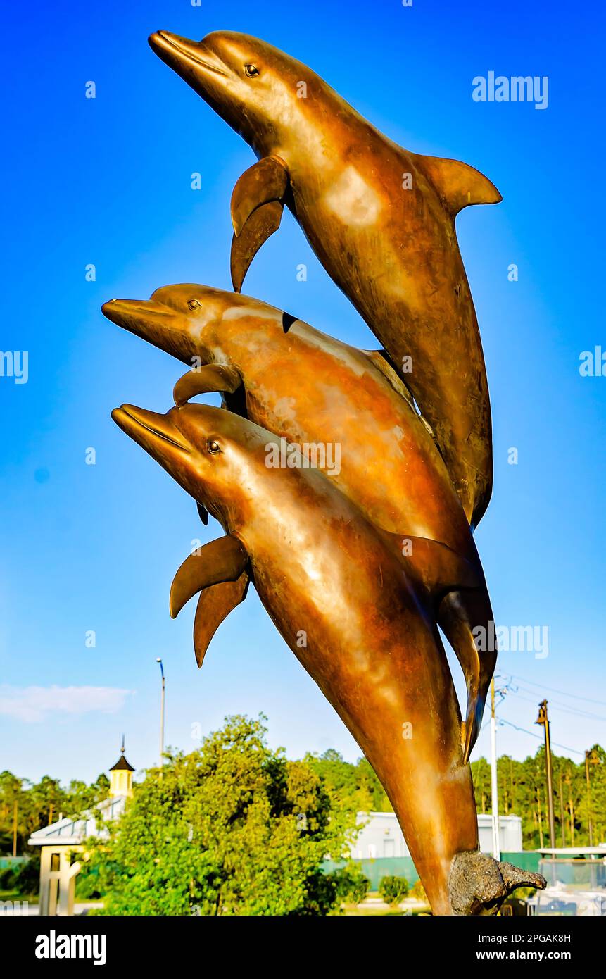 A dolphin sculpture stands in front of the Alabama Welcome Center ...