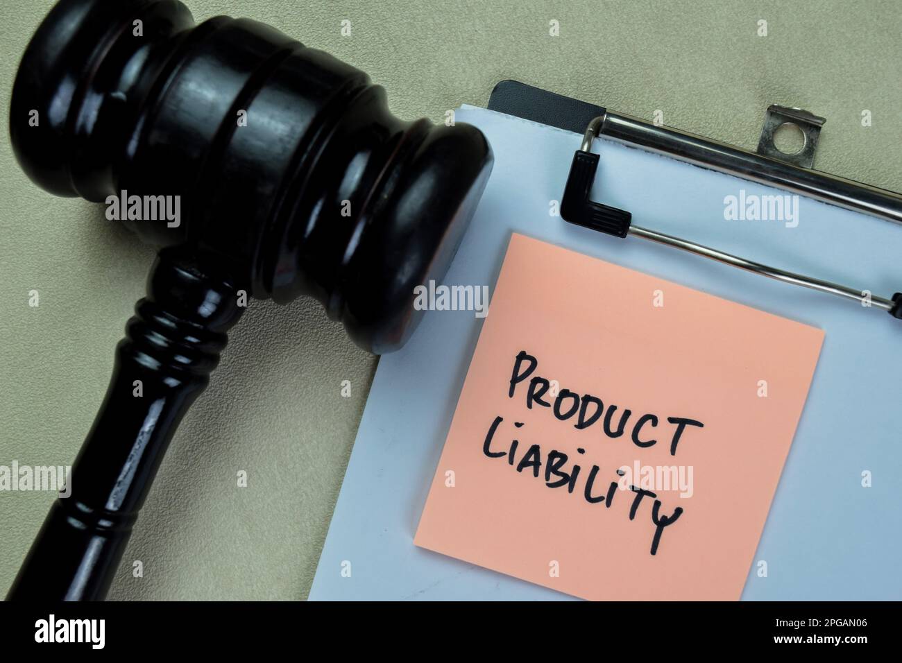 Concept of Product Liability write on sticky notes with gavel isolated ...