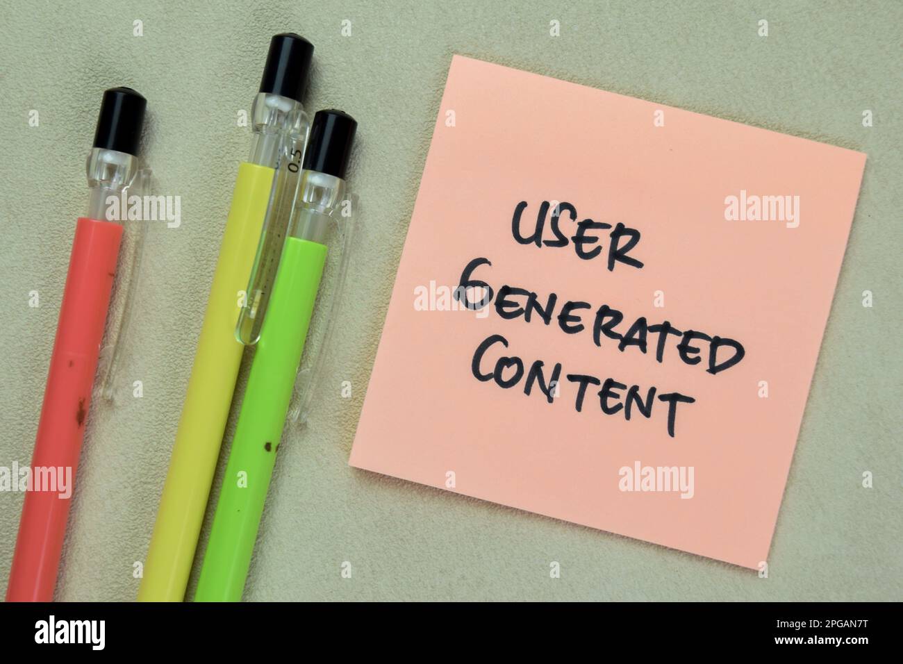 Concept of User Generated Content write on sticky notes isolated on ...