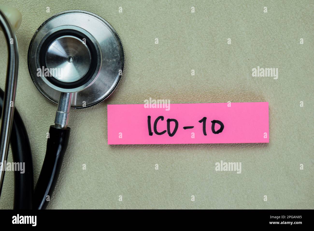 Concept of ICD-10 write on sticky notes with stethoscope isolated on ...