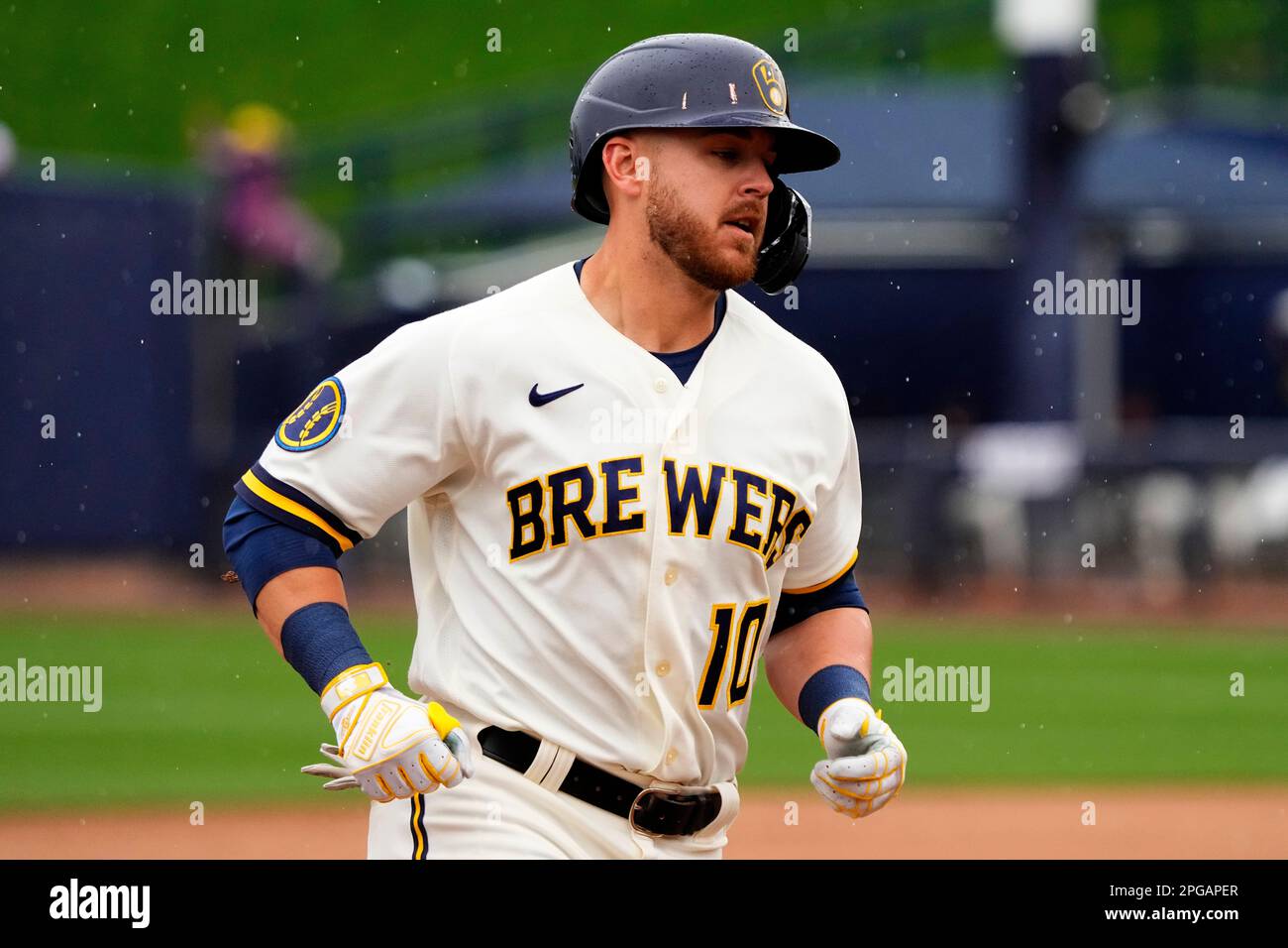 Milwaukee Brewers' Mike Brosseau (10) rounds the bases after hitting a ...
