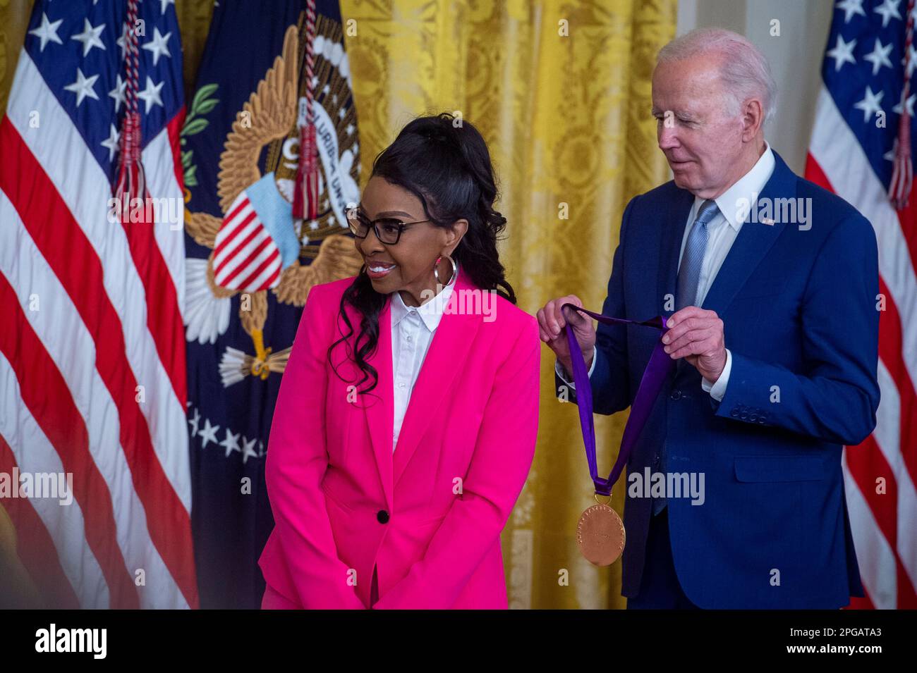 United States President Joe Biden, right, presents the Arts and ...