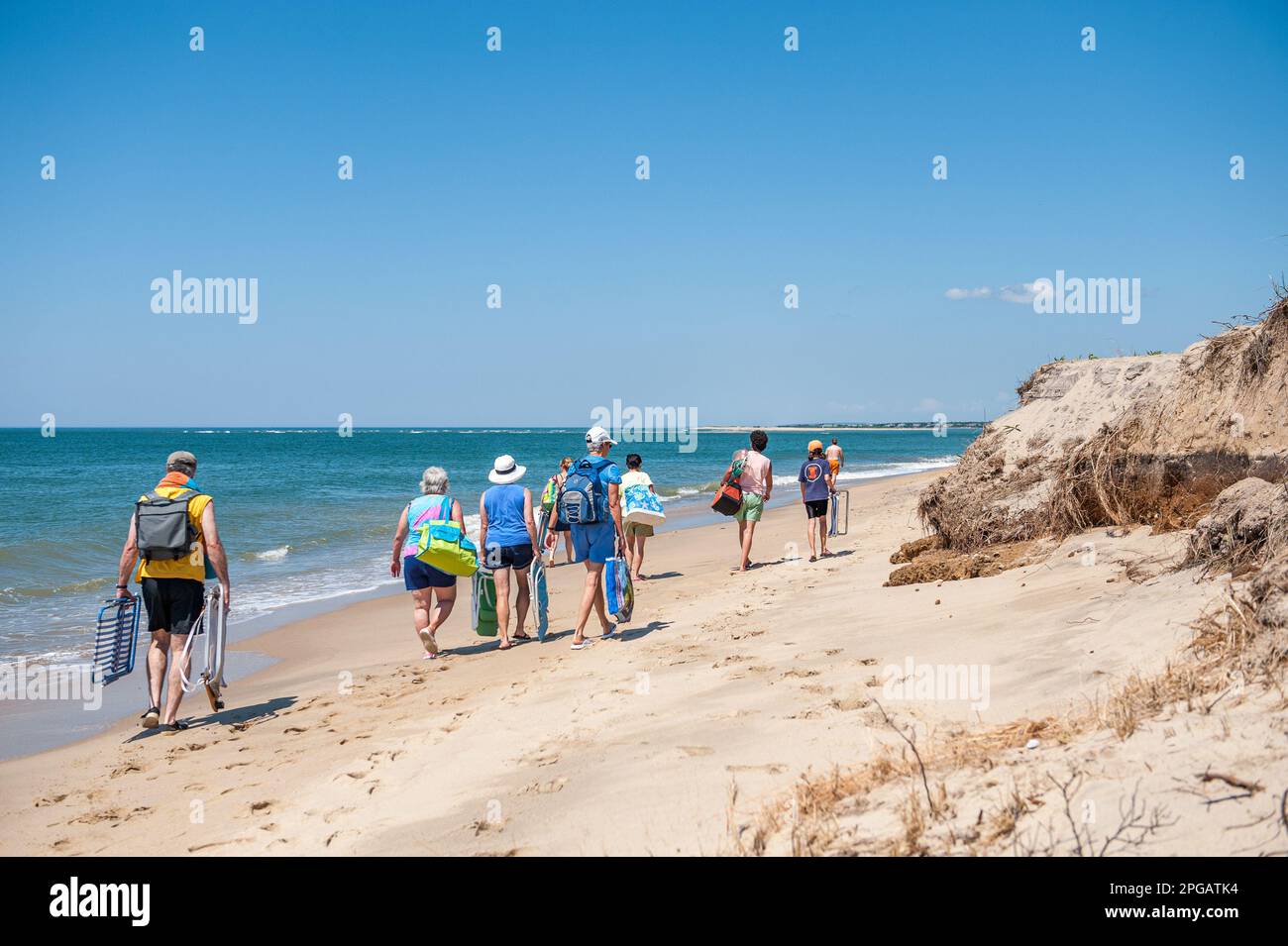 Tourists going for a swim at Wasque beach during summer in ...
