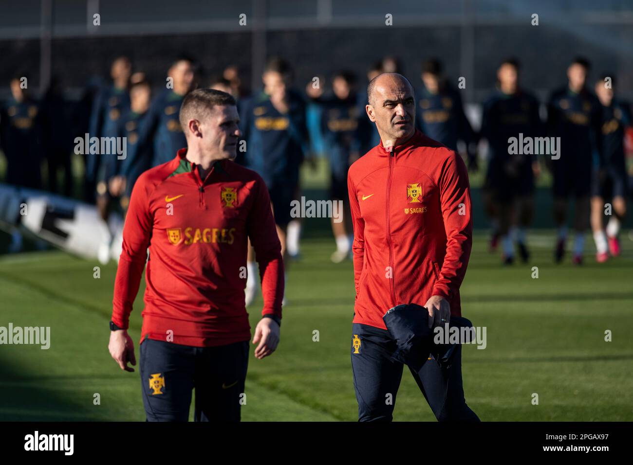 Oeiras, Portugal. 21st Mar, 2023. Roberto Martinez (R), head coach of ...