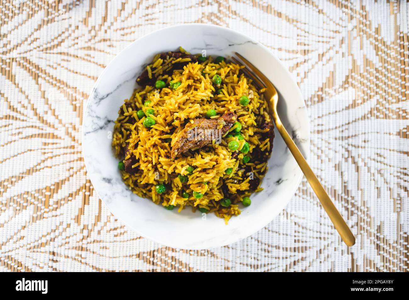 plant-based fried rice with soy based meat chunks, healthy vegan food ...