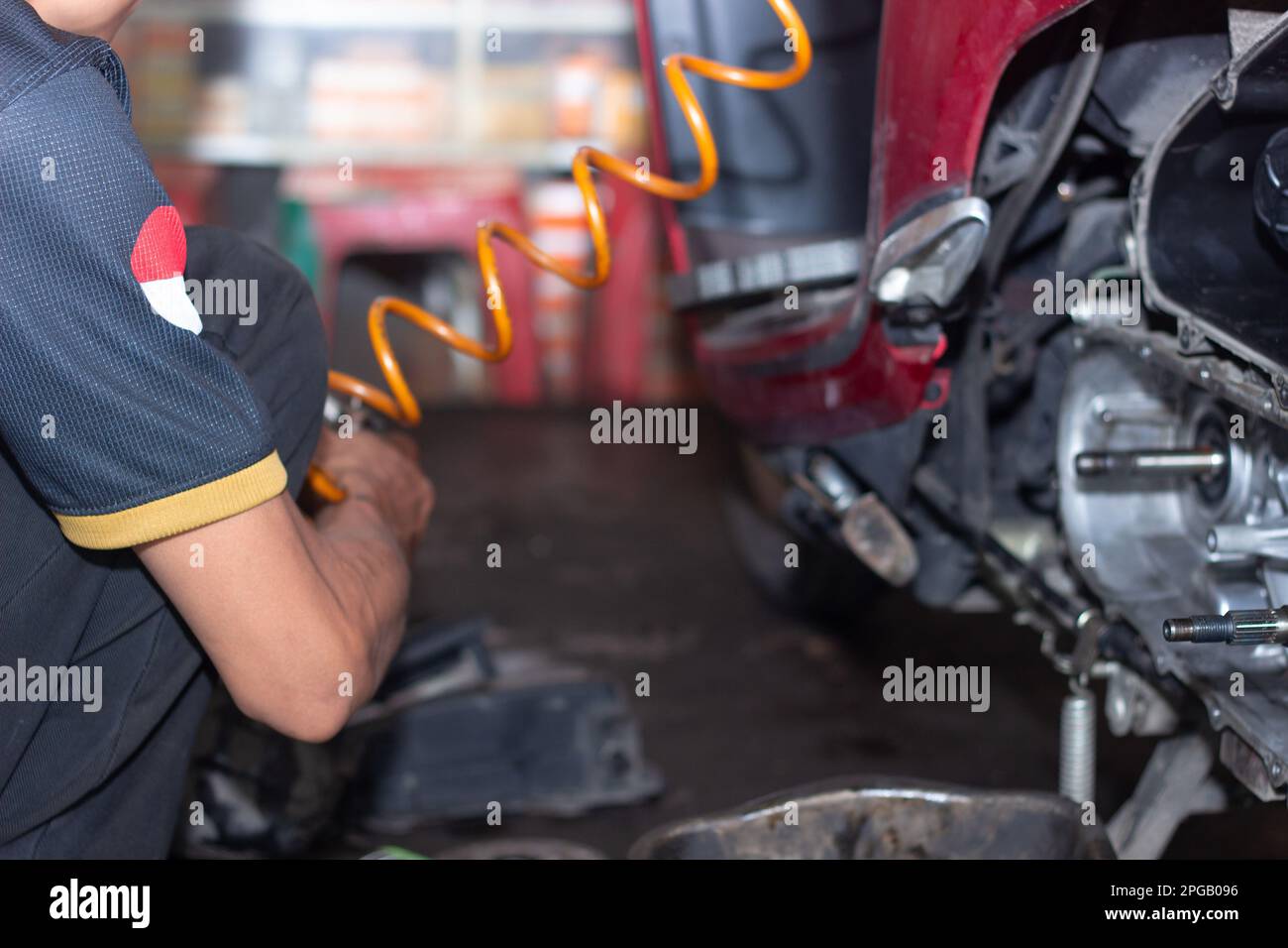 Motorcycle mechanic check the condition of Auto Transmission system or ...