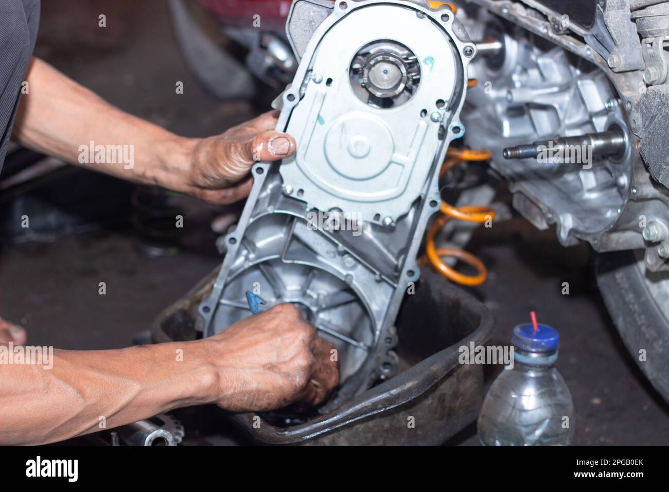 Motorcycle mechanic check the condition of Auto Transmission system or ...