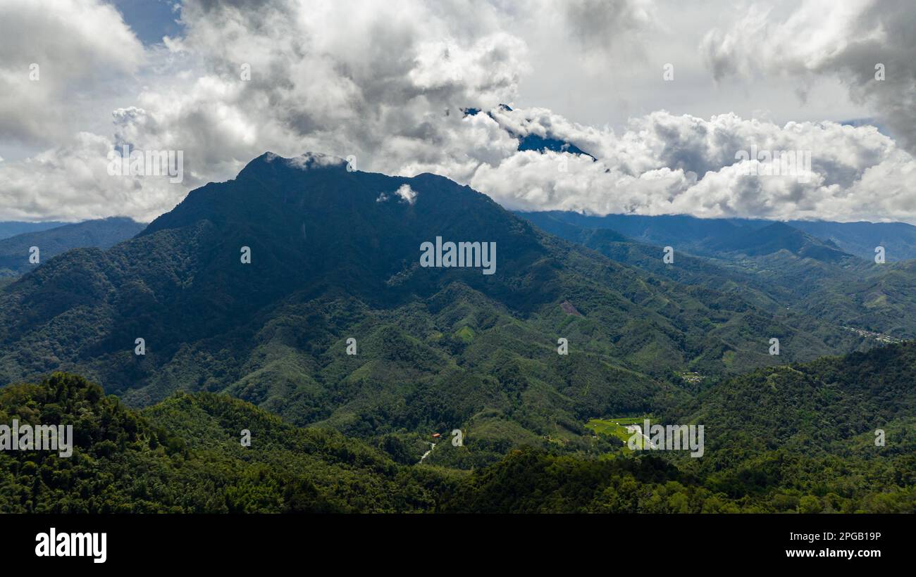 Aerial view of Mountain peaks covered with forest. Mount Kinabalu ...
