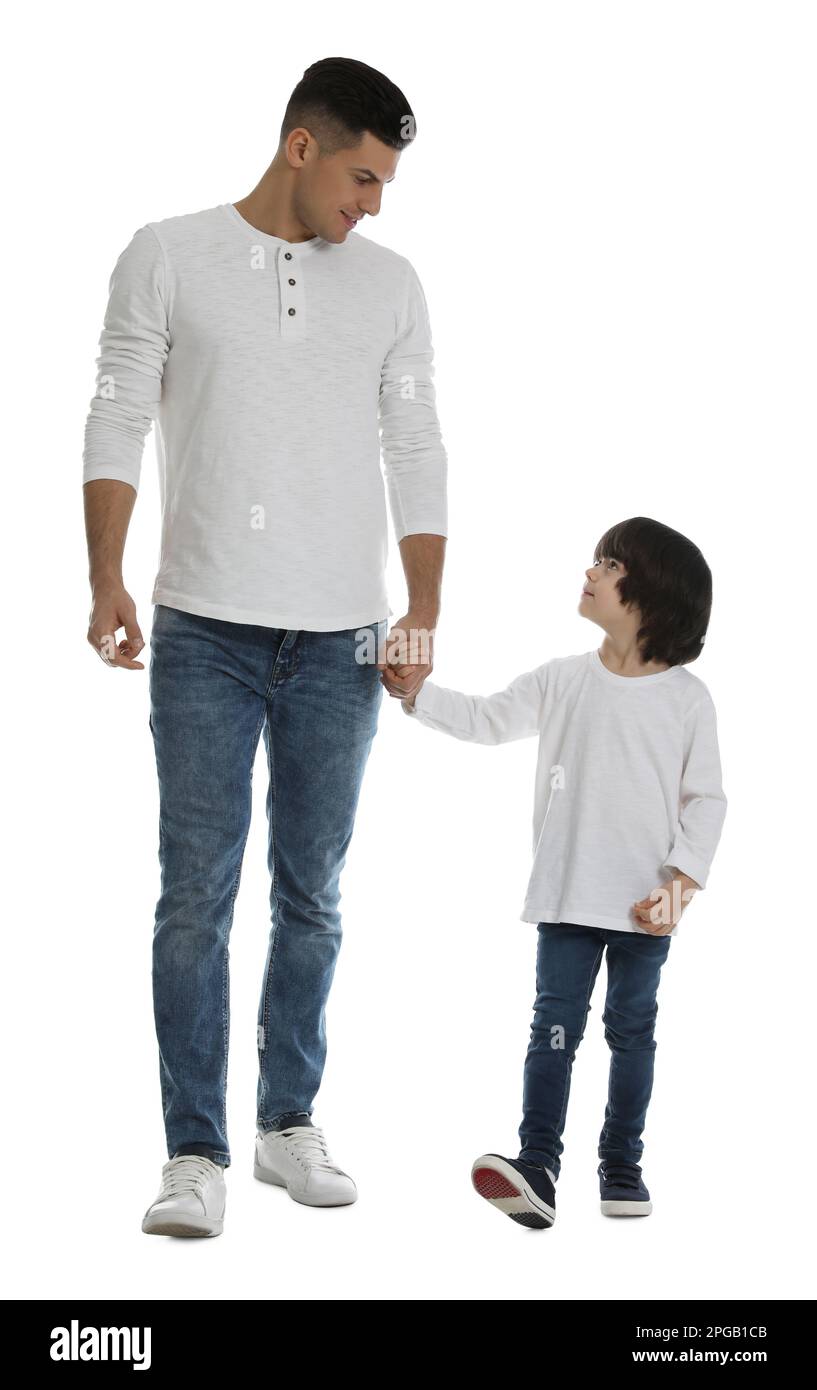 Little boy with his father on white background Stock Photo - Alamy