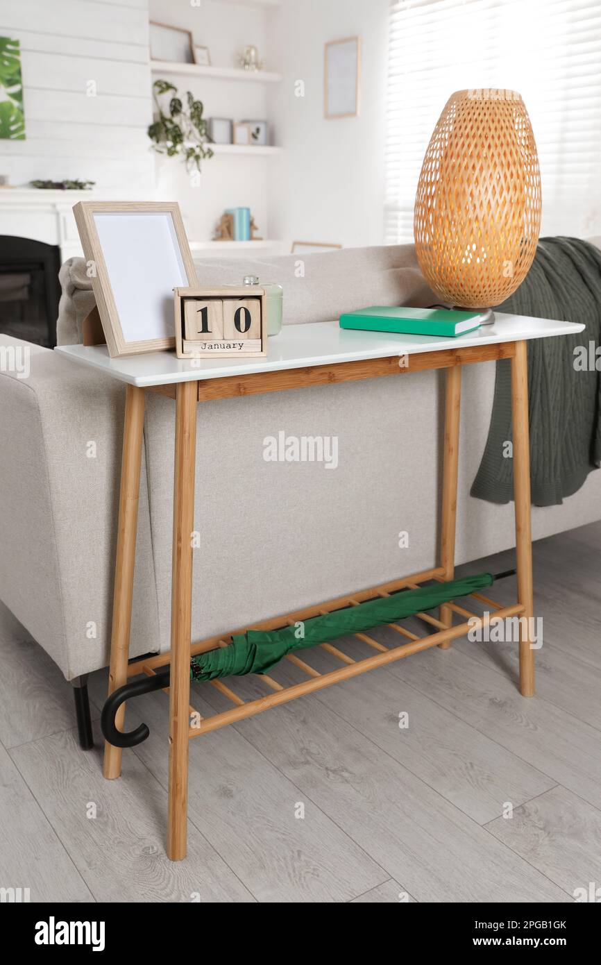 Living room interior with console table and stylish decor Stock Photo ...