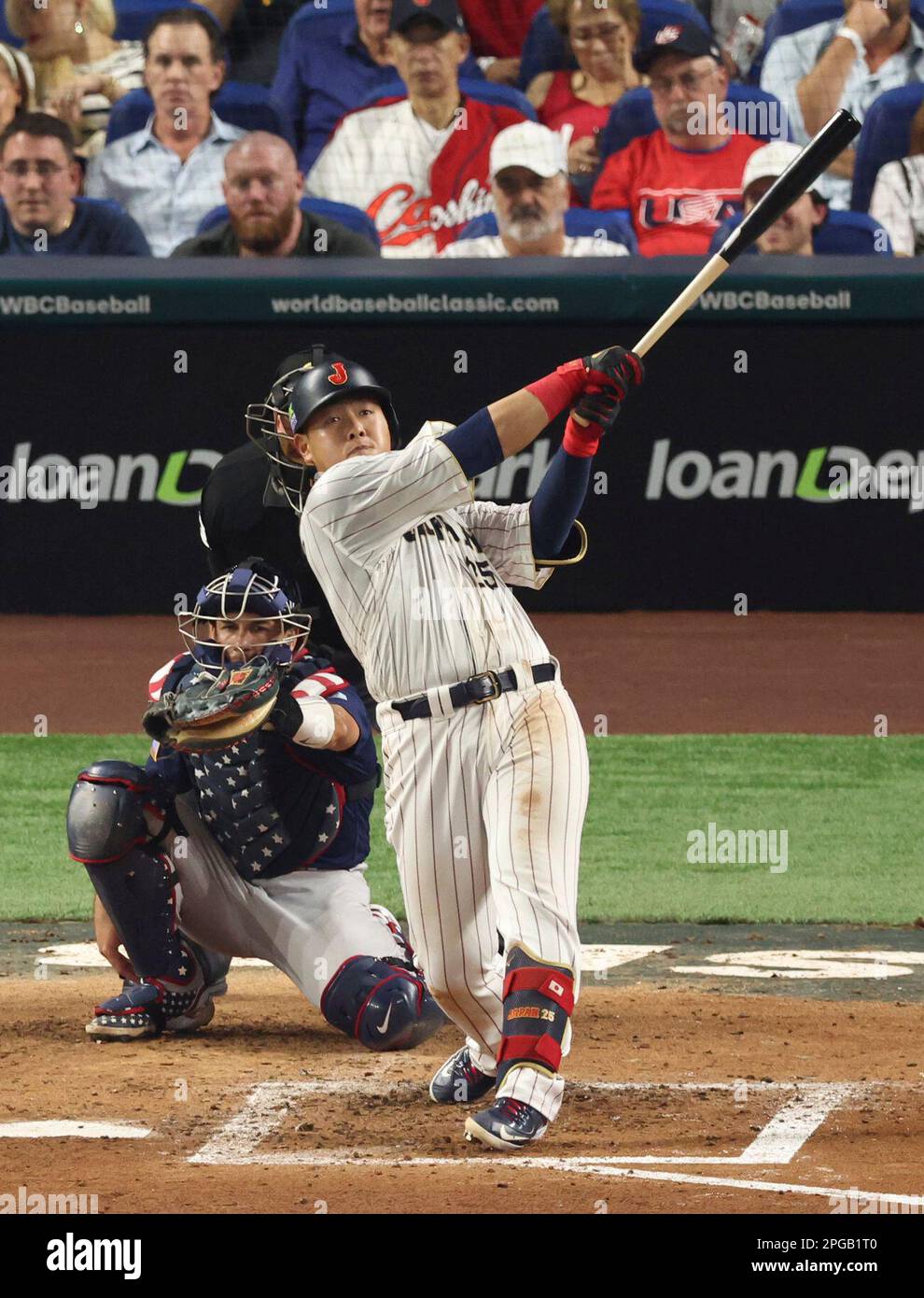 Japan's Kazuma Okamoto homers in the 4th inning of the World Baseball Classic (WBC) final match ...