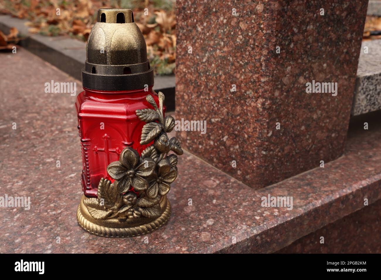 Grave lantern on granite surface at cemetery, space for text Stock Photo - Alamy