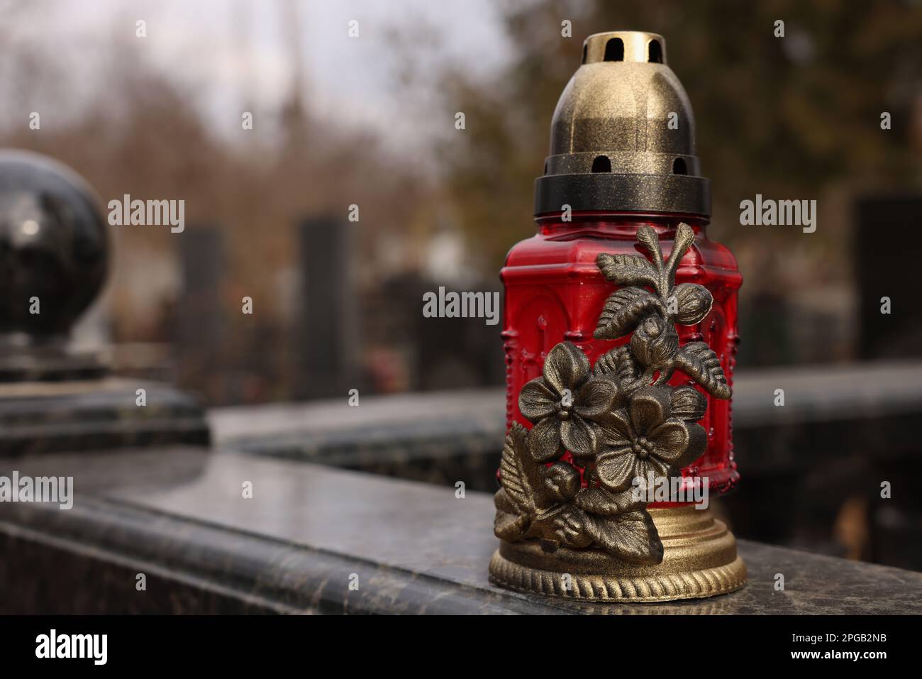 Grave lantern on granite surface at cemetery, space for text Stock Photo - Alamy