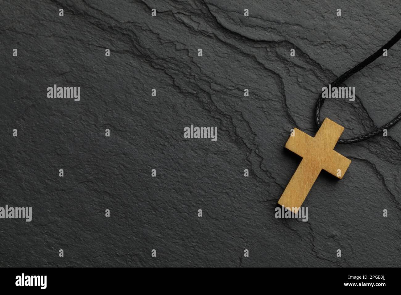 Christian cross on black table, top view. Space for text Stock Photo ...