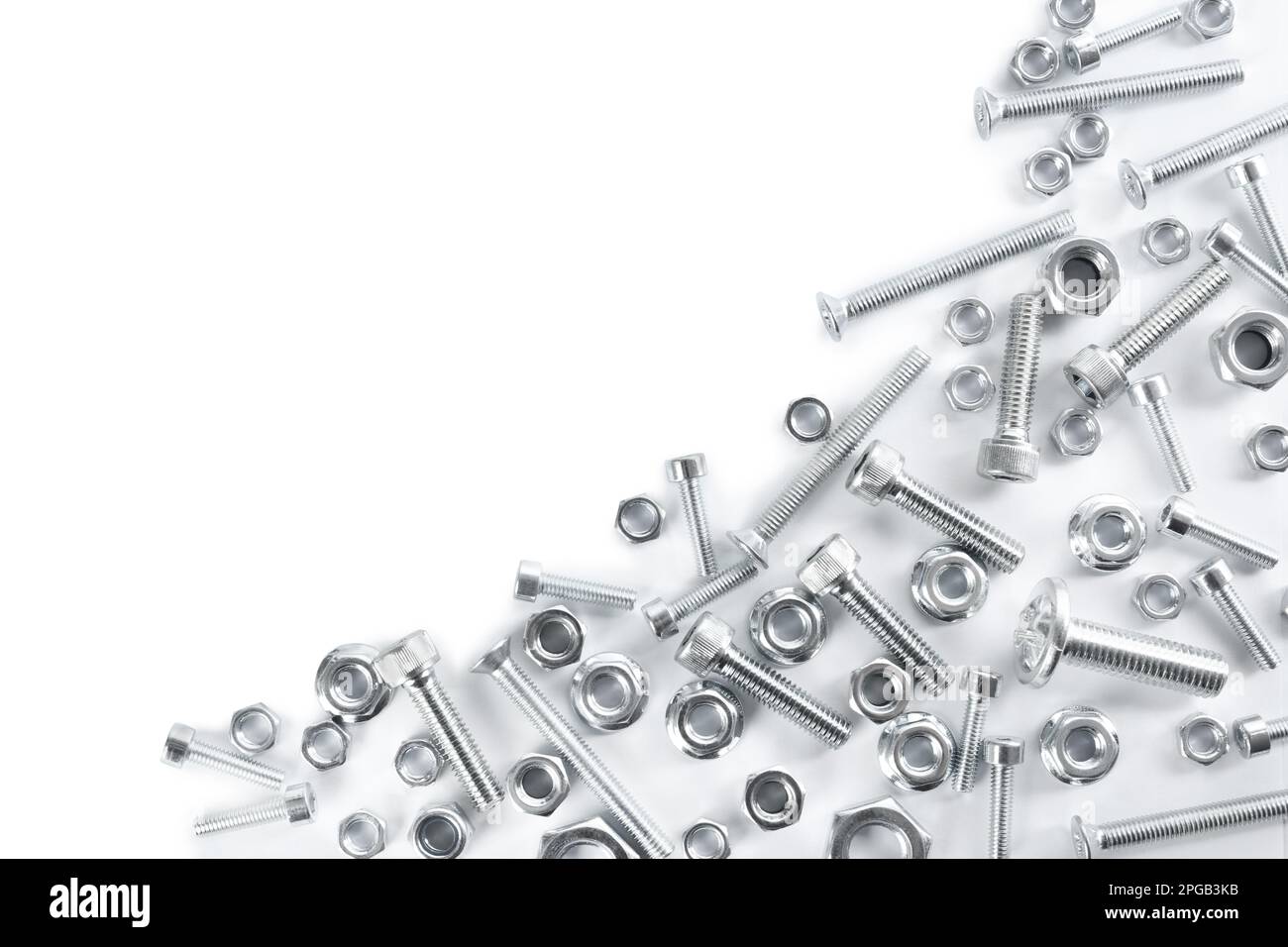 Different metal bolts and nuts on white background, top view Stock ...