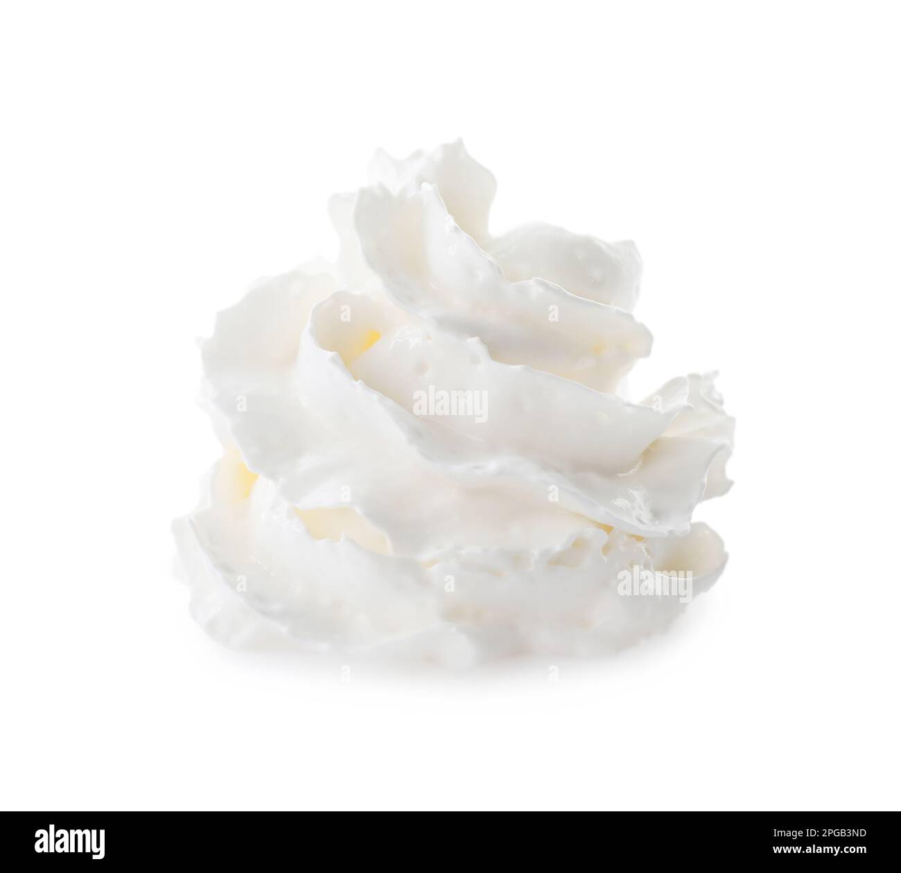 Whipped cream swirl isolated on white background Stock Photo - Alamy