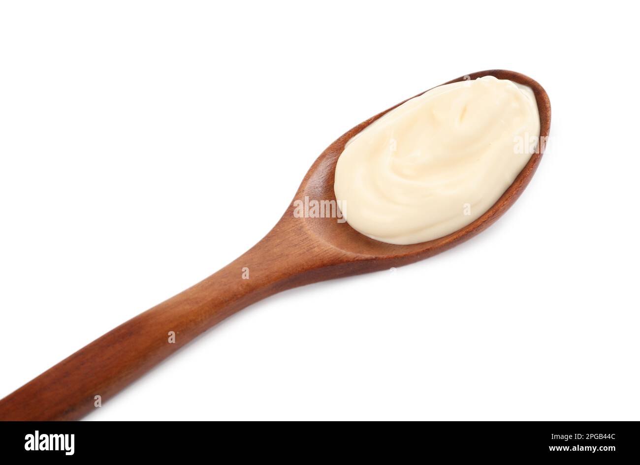 Wooden spoon with mayonnaise isolated on white Stock Photo - Alamy