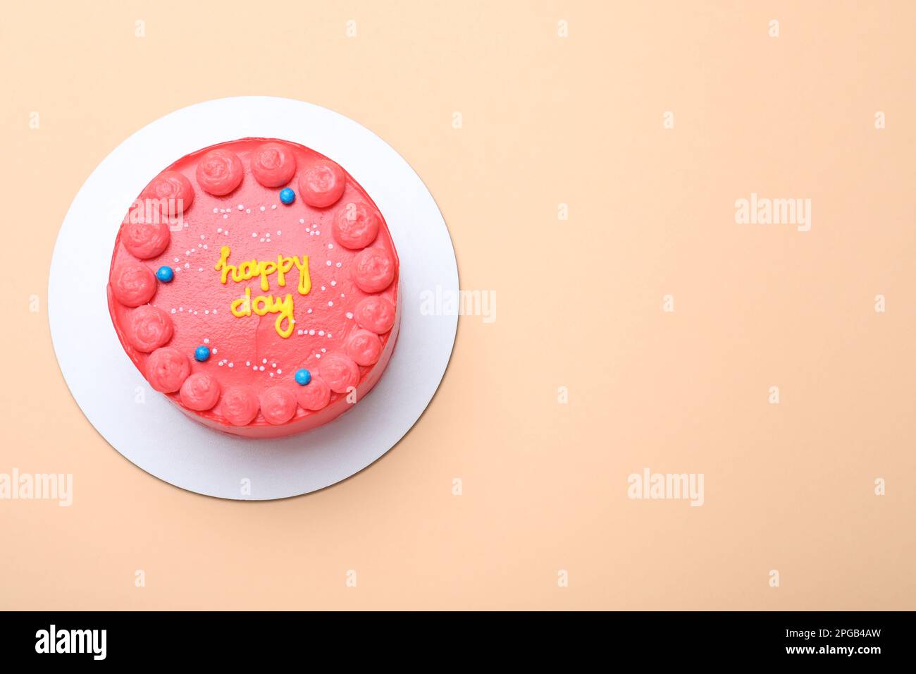 Cute bento cake with tasty cream on beige background, top view. Space ...