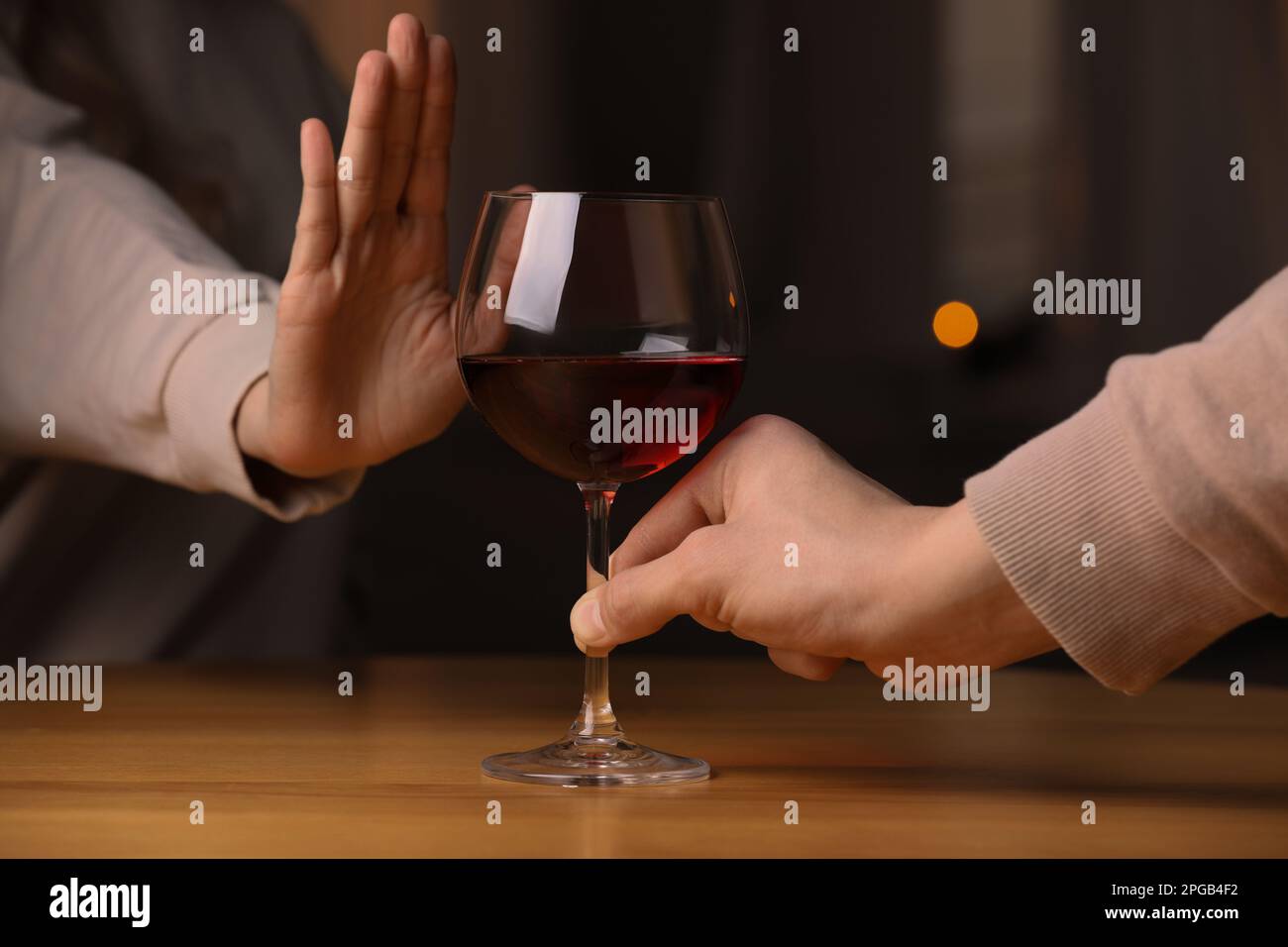 Woman refuse wine hi-res stock photography and images - Alamy