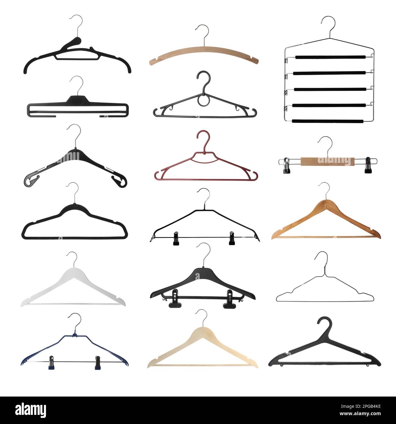 Set with different empty hangers on white background Stock Photo - Alamy