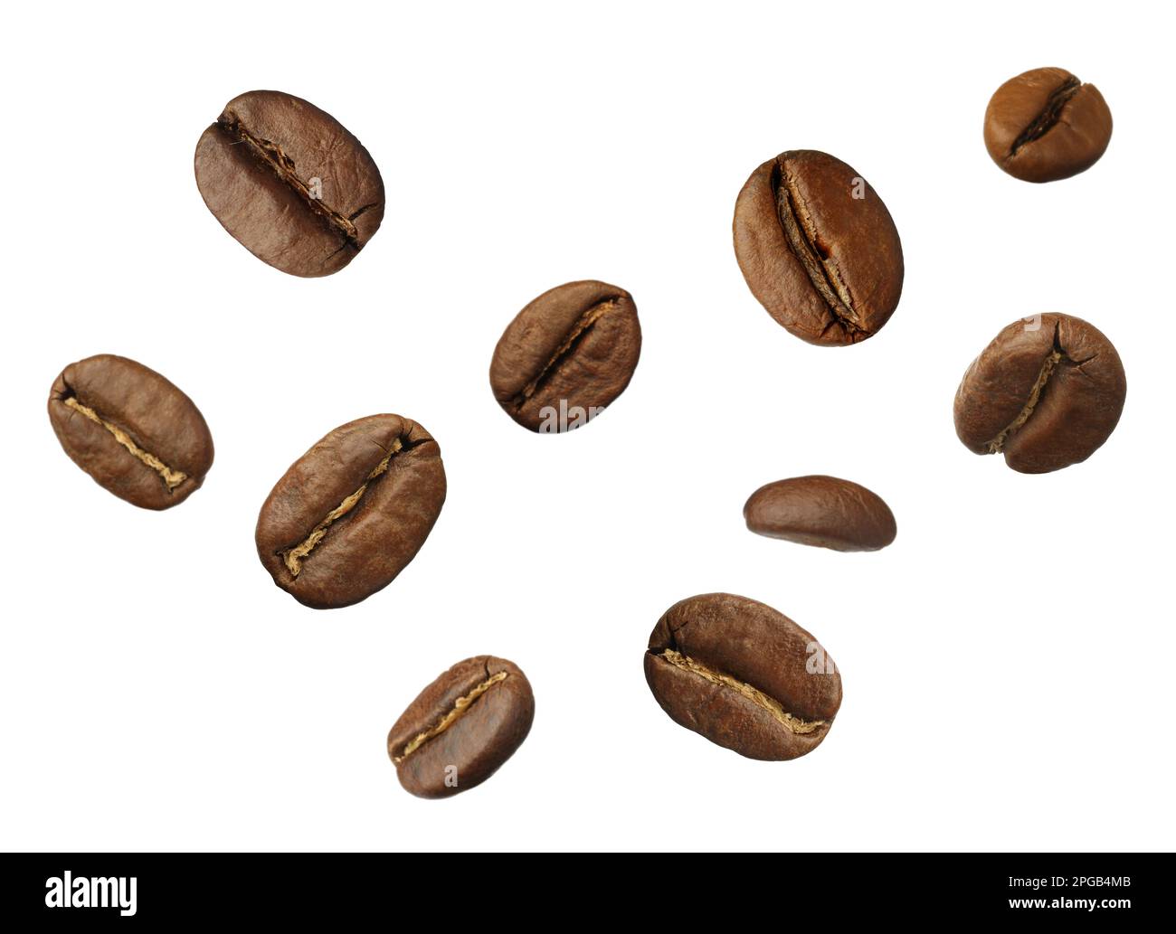 Many roasted coffee beans flying on white background Stock Photo - Alamy
