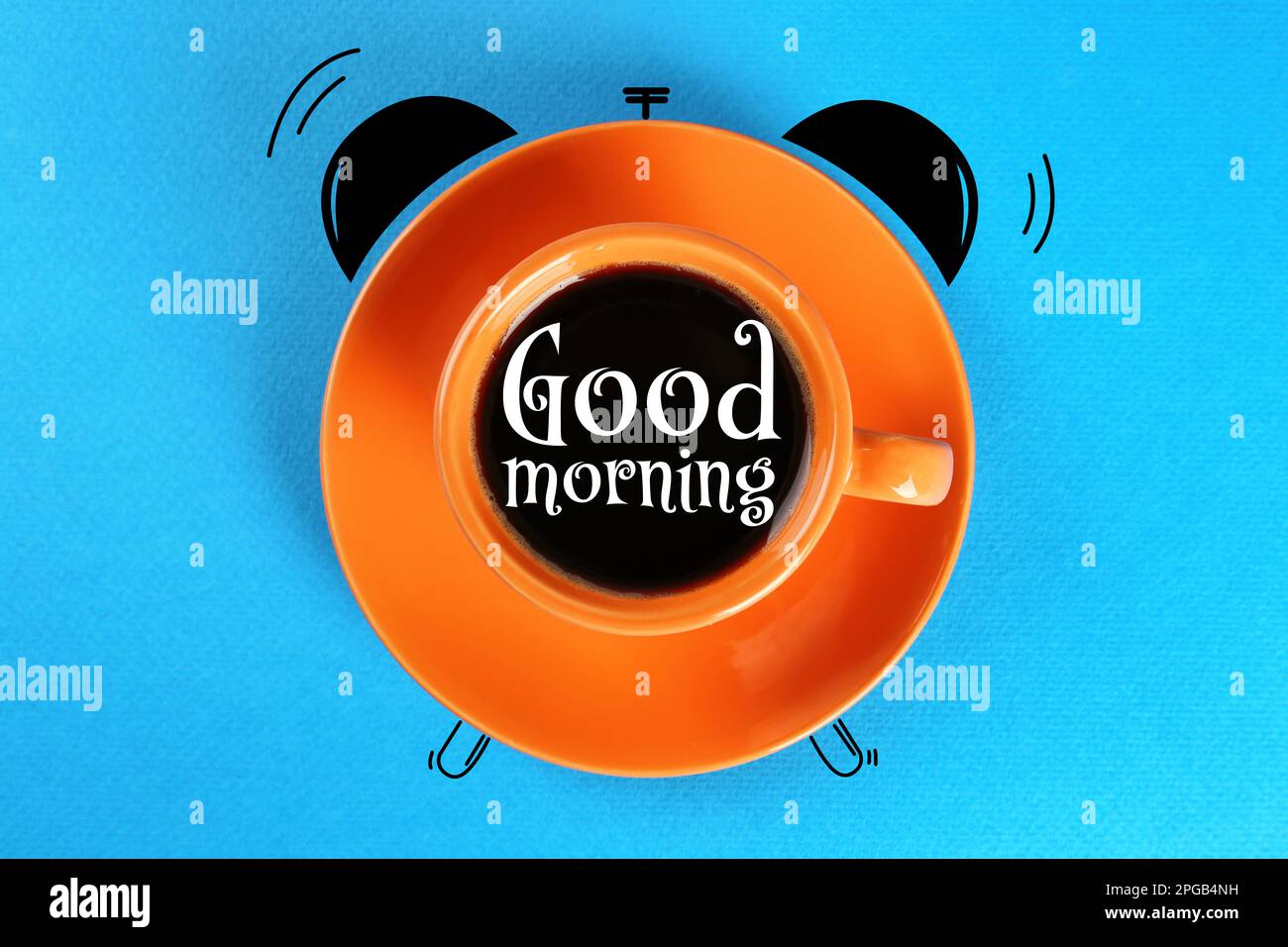 Coffee in cup on light blue background, top view. Good Morning Stock ...