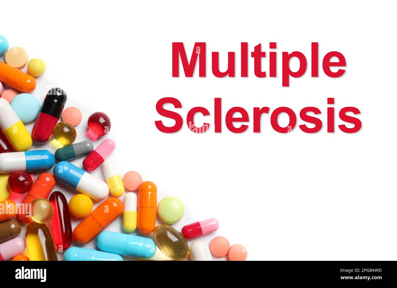 Multiple sclerosis treatment. Many different pills on white background ...