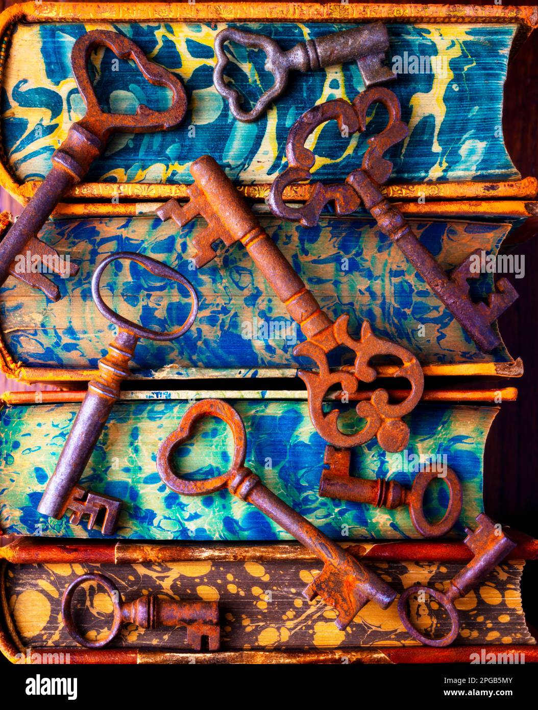 Wonderful Old Skeleton Keys On Rare Books Still Life Stock Photo - Alamy