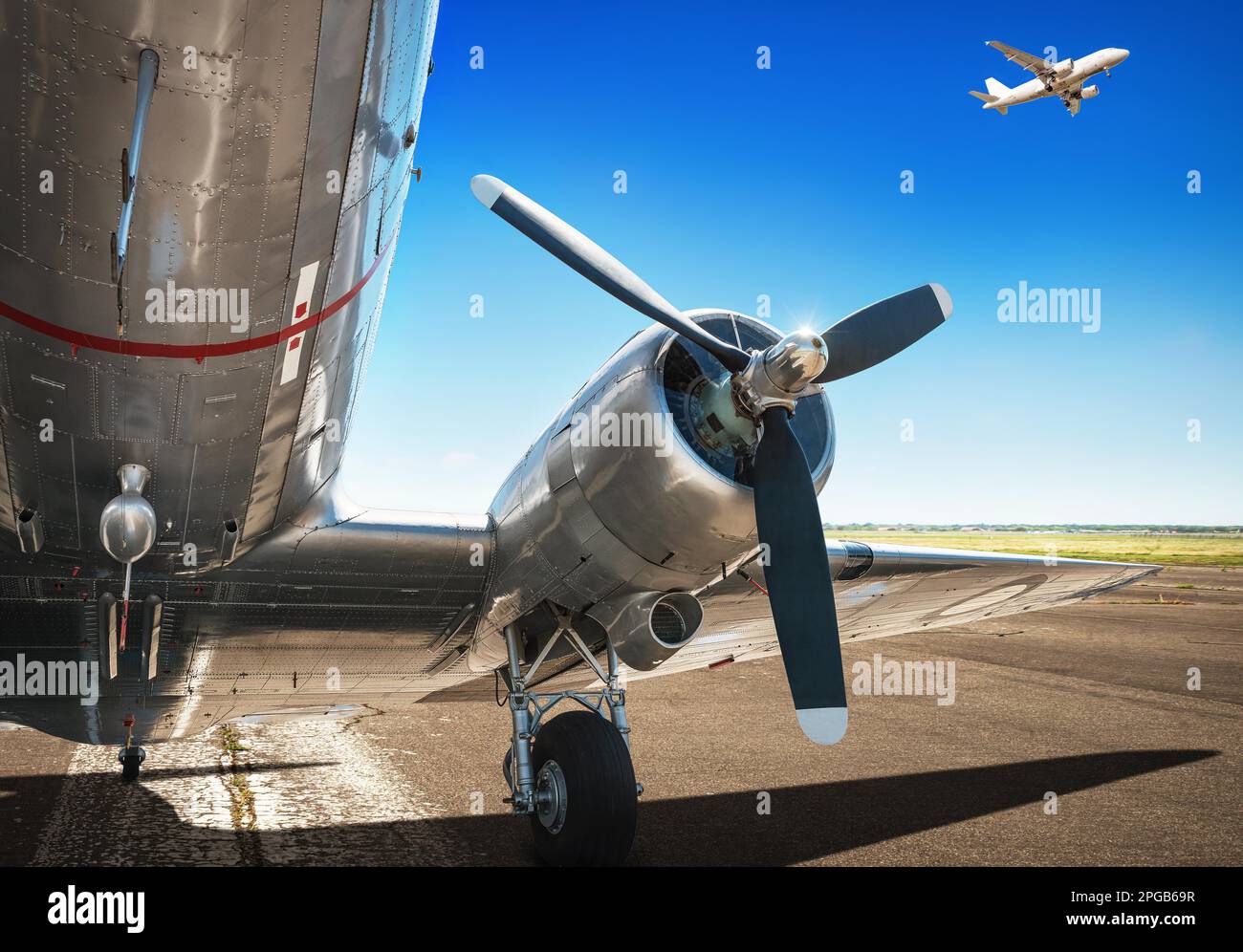 old airplane on a runway Stock Photo - Alamy