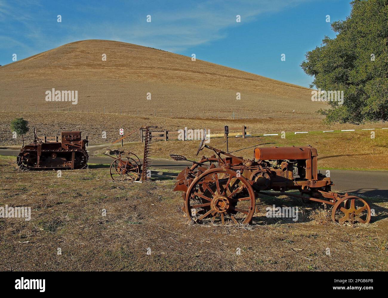 rusty old tractor and other farming equipment at Garin East Bay ...
