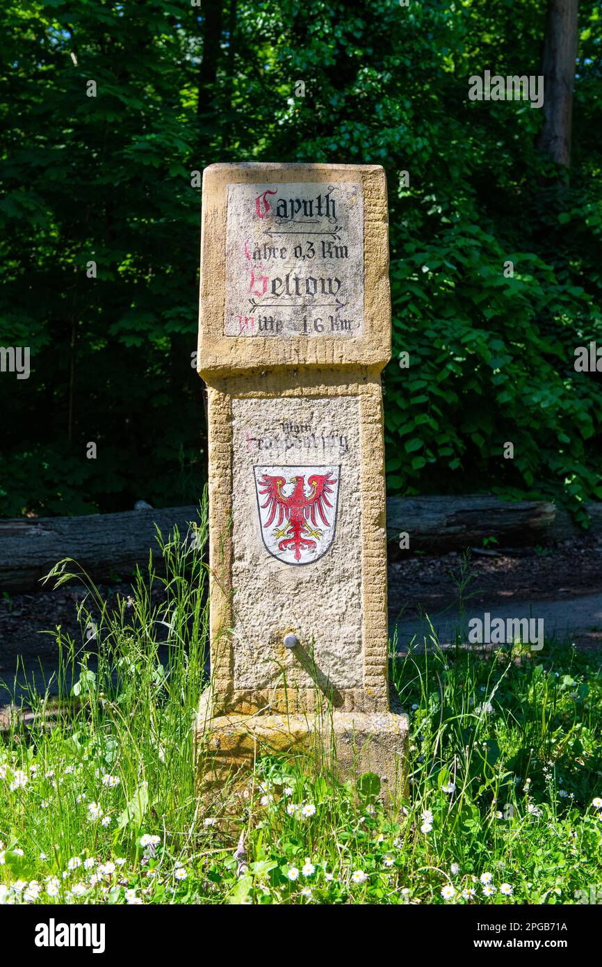 Historical signpost with heraldic animal Brandenburg eagle between ...