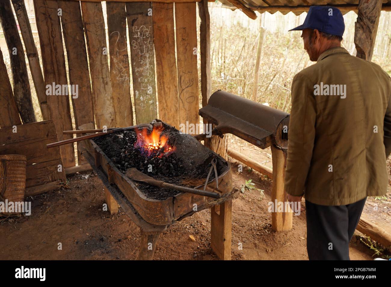 Blacksmith, Hmong village, Hmong, Hmong people, near Phonsavan, Xieng ...