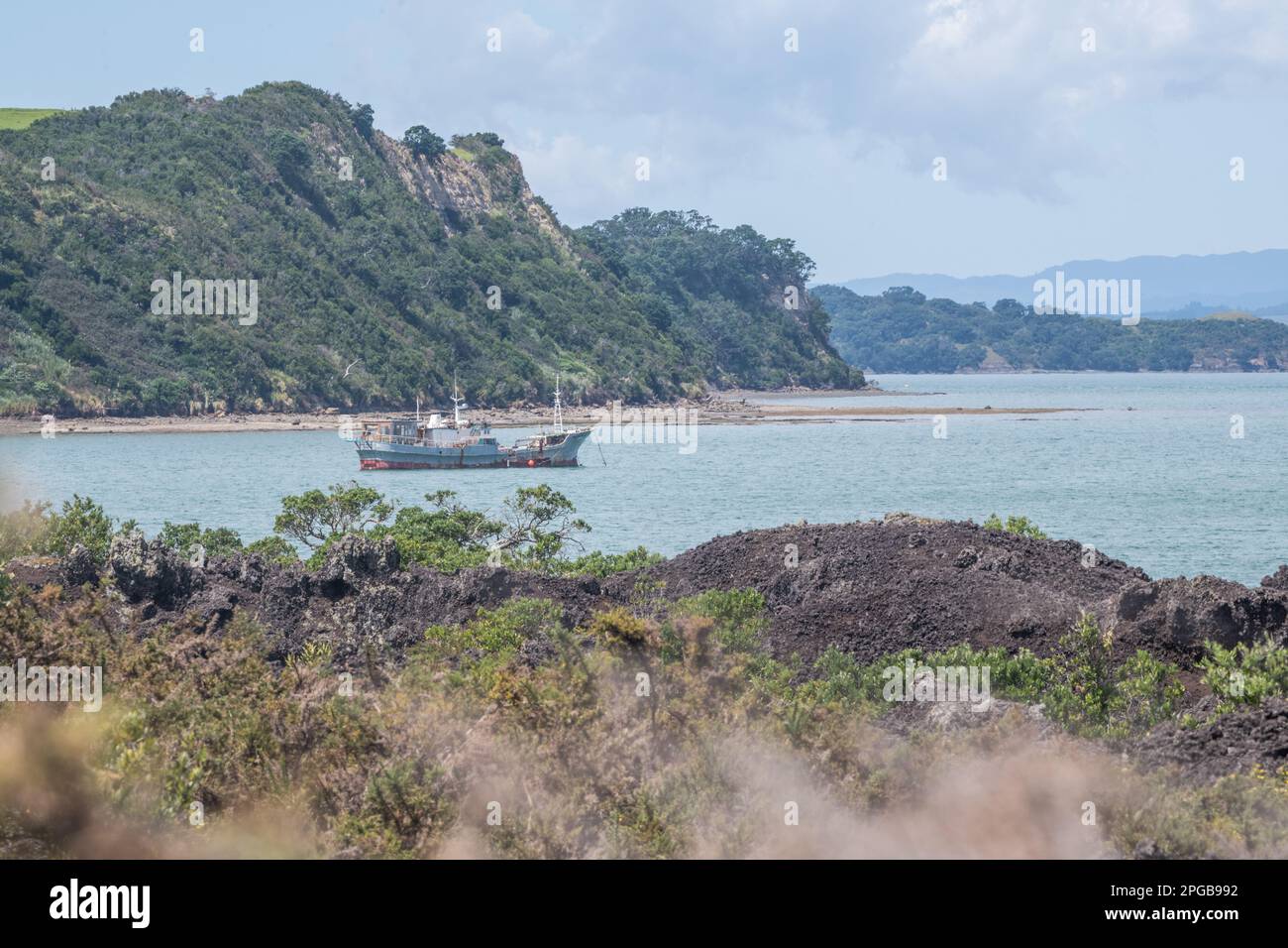 A ship in Islington bay between Rangitoto and Motutapu island, as seen ...