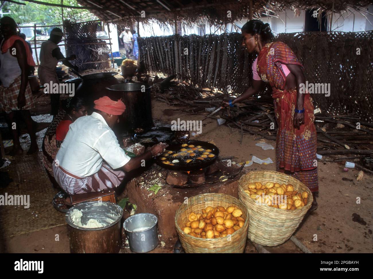 Preparing a sweet appam for Nattukottai Chettiar; Nagarathar wedding ...
