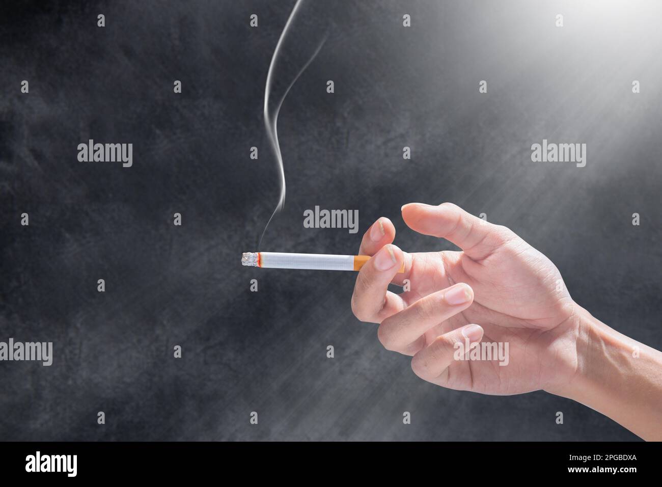 Closeup view of a man smoking a cigarette. World No Tobacco Day Concept ...