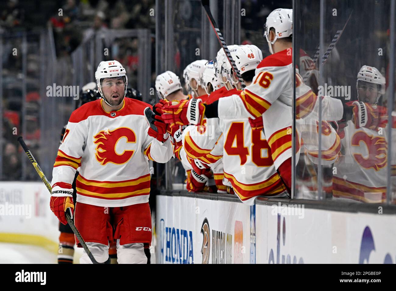 Calgary Flames left wing Nick Ritchie, left, celebrates with teammates ...