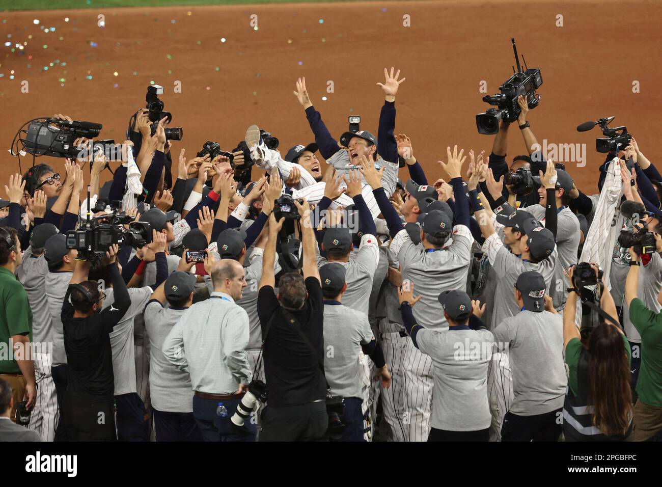 Hideki Kuriyama, a manager of Japan National Team is lifted up after ...