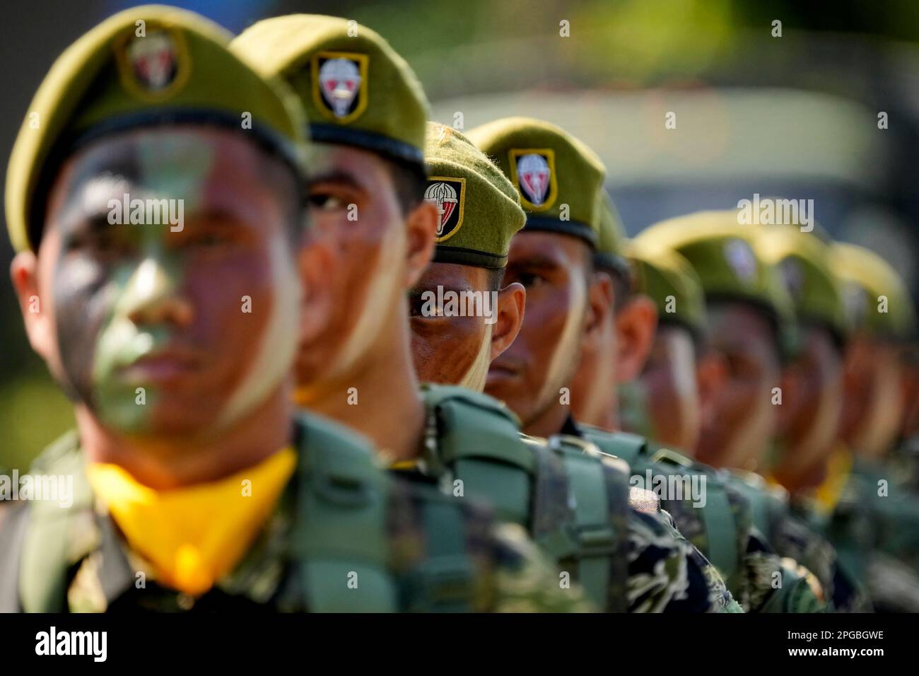 Filipino troopers stand during rites at the 126th founding anniversary ...