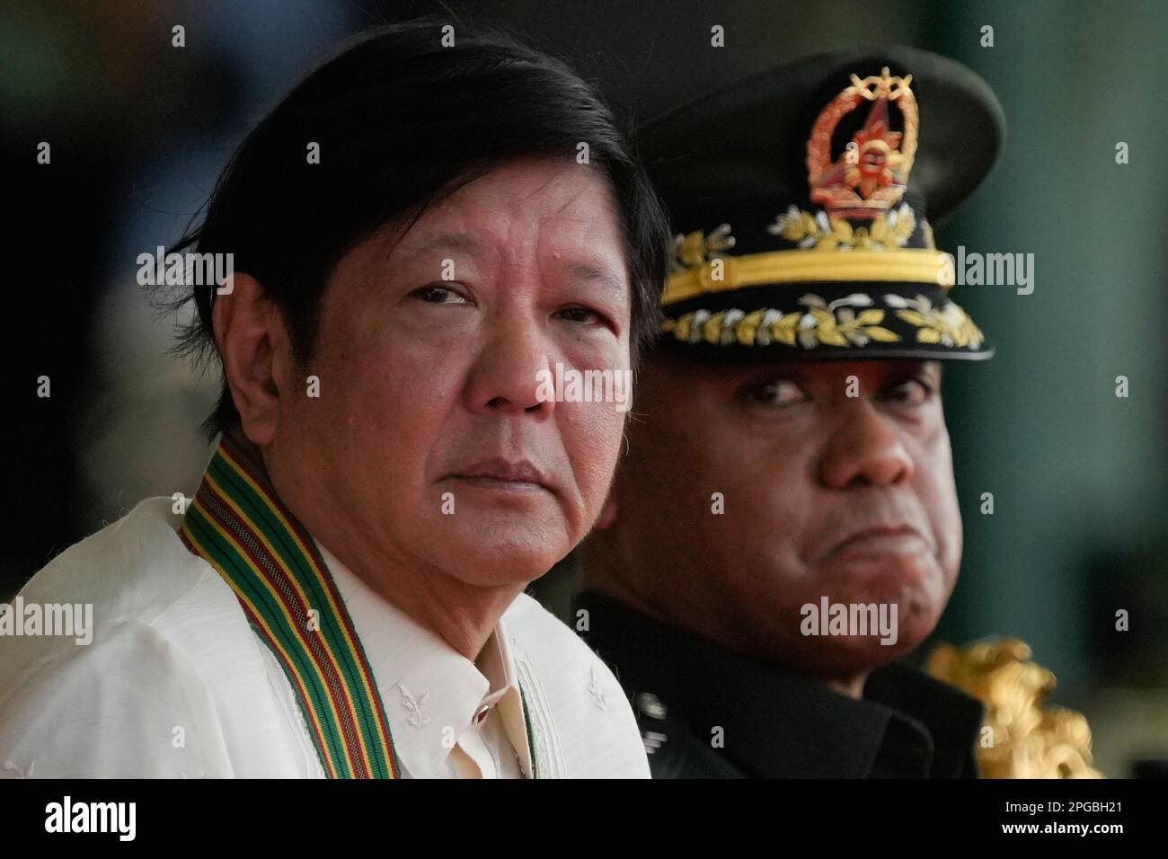 Philippine President Ferdinand Marcos Jr., left, sits beside Philippine ...