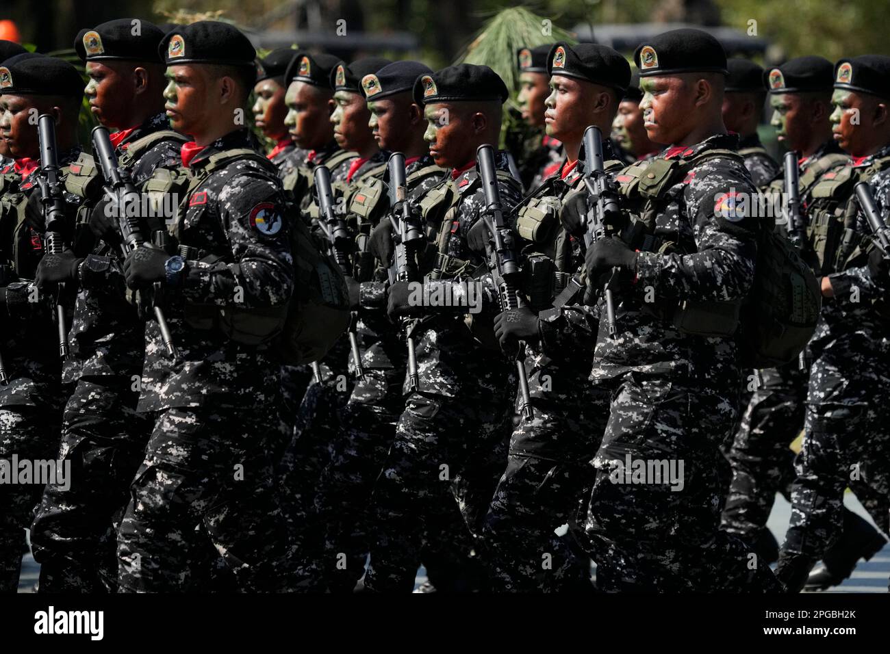 Filipino troopers march during rites at the 126th founding anniversary ...