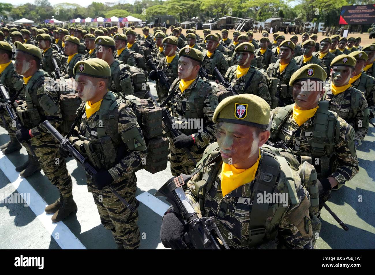 Filipino troopers stand during rites at the 126th founding anniversary ...