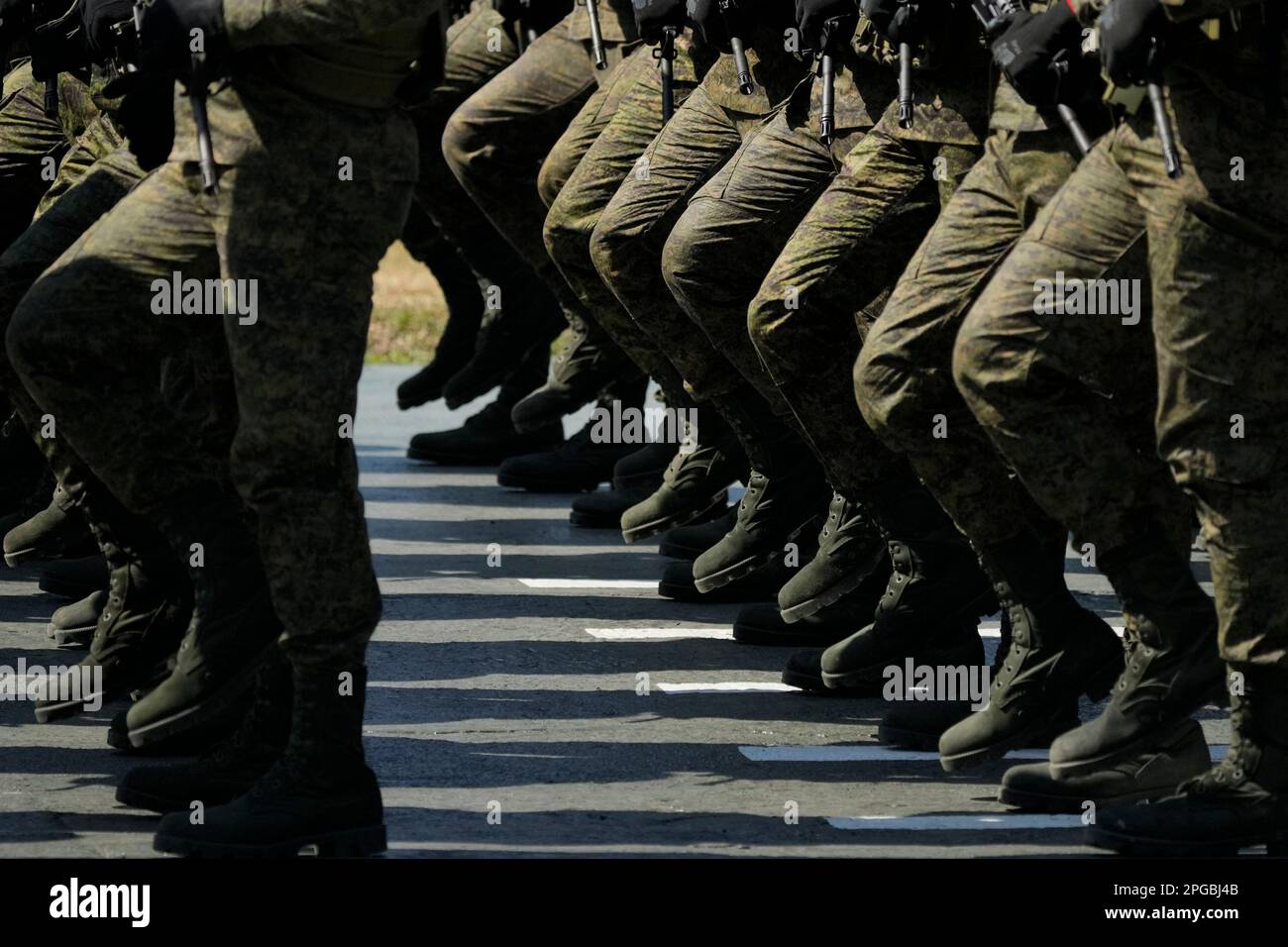 Filipino troopers march during rites at the 126th founding anniversary ...